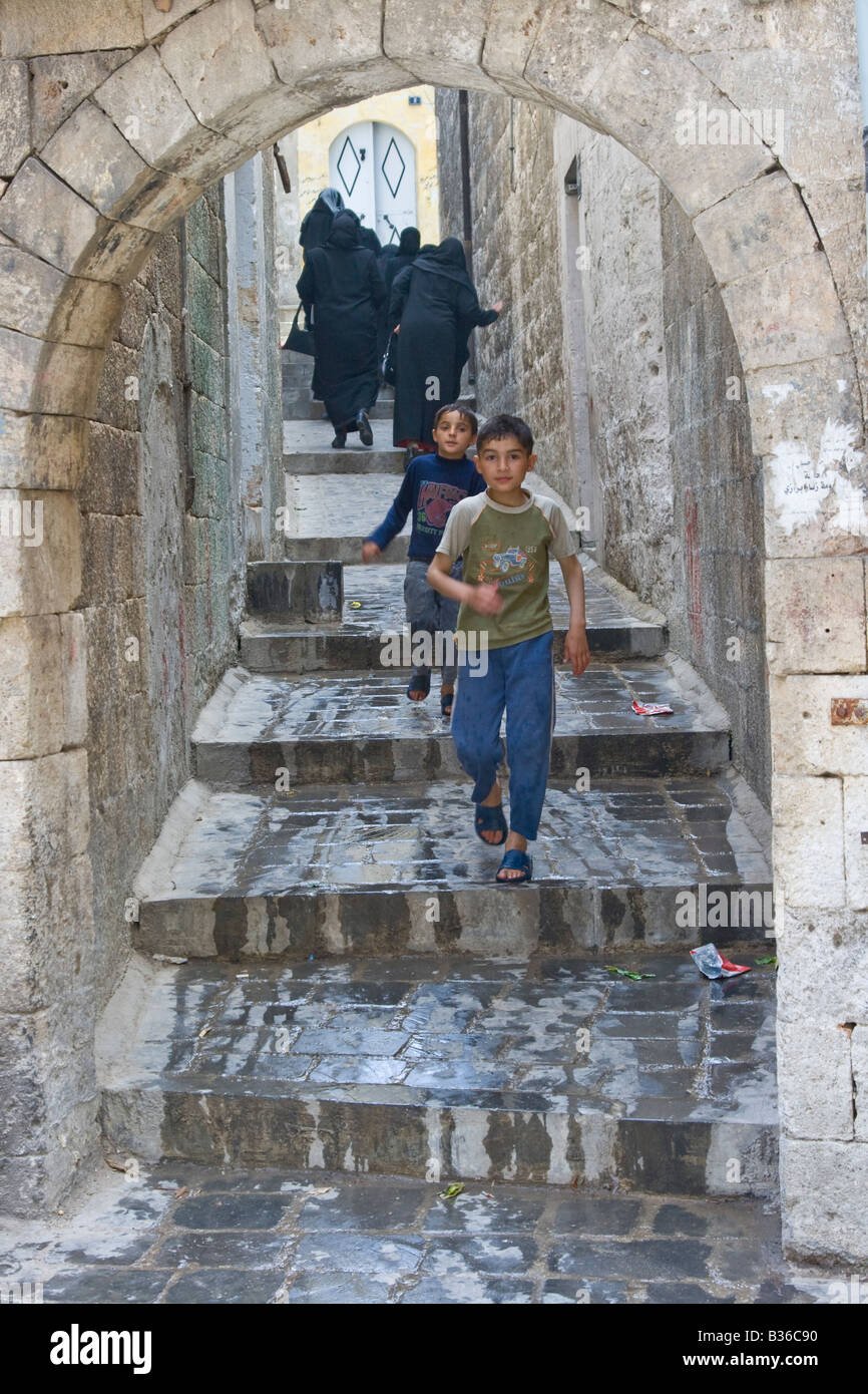 Muslim woman running stairs hi-res stock photography and images - Alamy