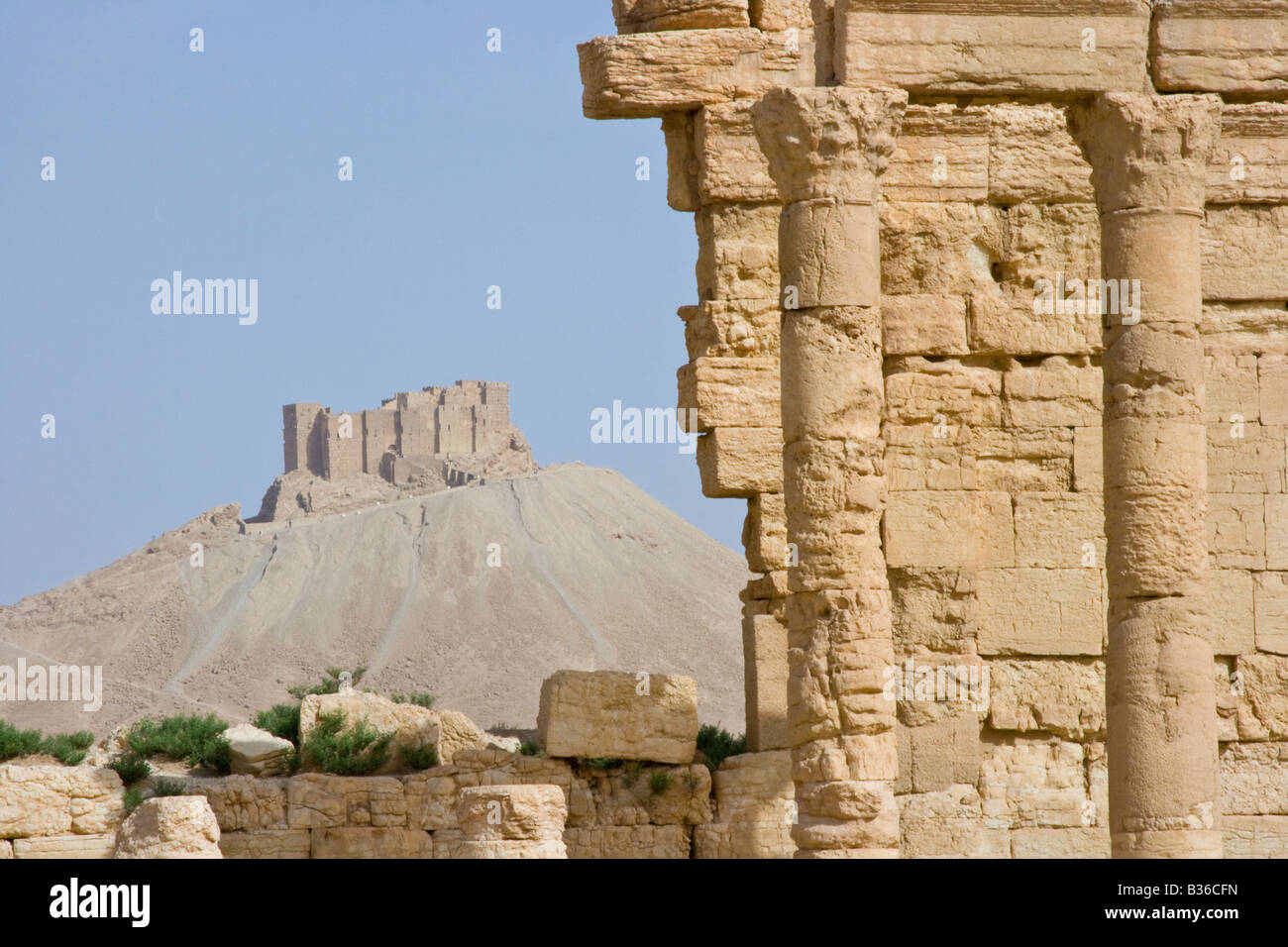 Arab Castle Qalaat Ibn Maan and Roman Ruins of Palmyra in Syria Stock ...