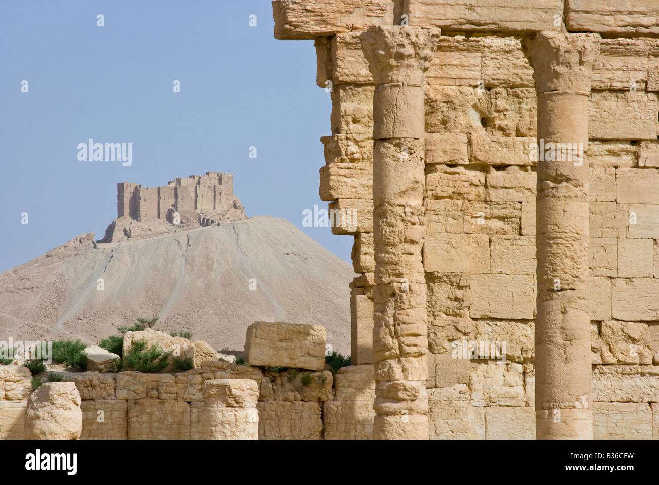 Arab Castle Qalaat Ibn Maan and Roman Ruins of Palmyra in Syria Stock ...