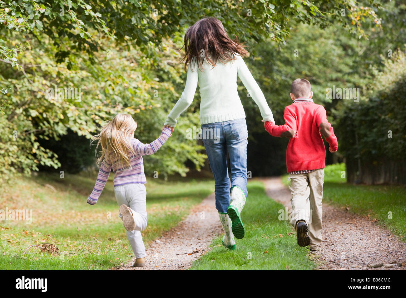 Children running on track hi-res stock photography and images - Alamy