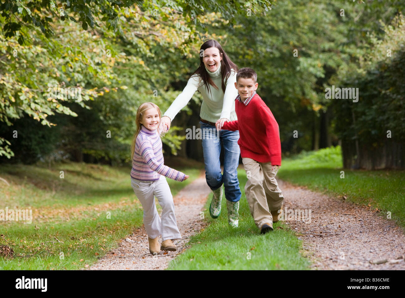 Two children playing running hi-res stock photography and images - Alamy