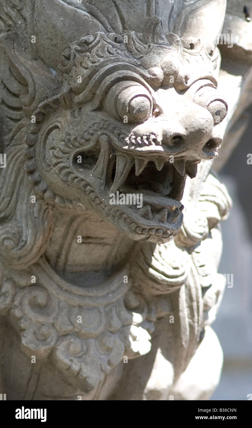 Balinese Stone Guardian Sculpture Stock Photo - Alamy