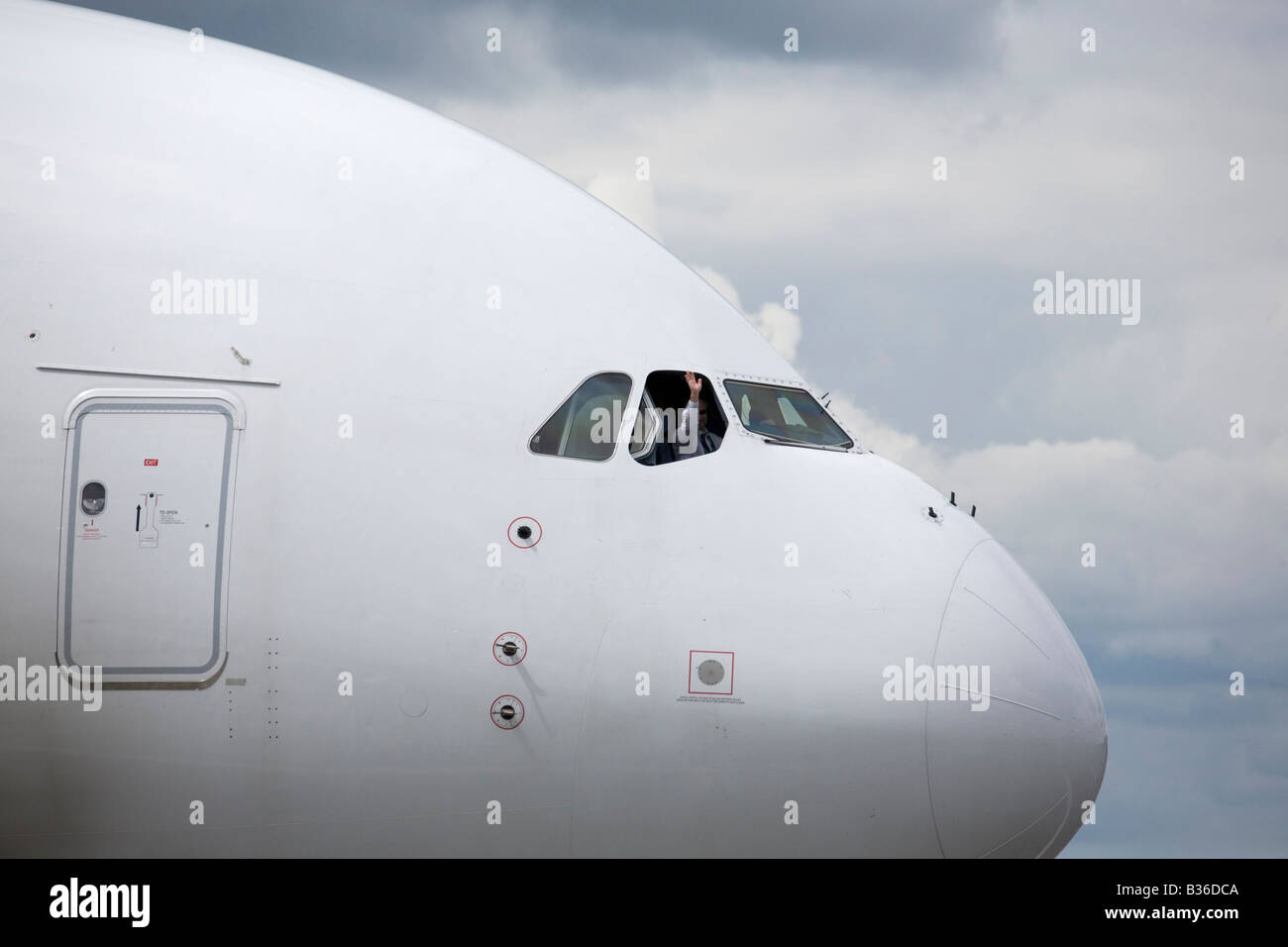 Pilot waving from cockpit of Airbus A380 at Farnborough International ...