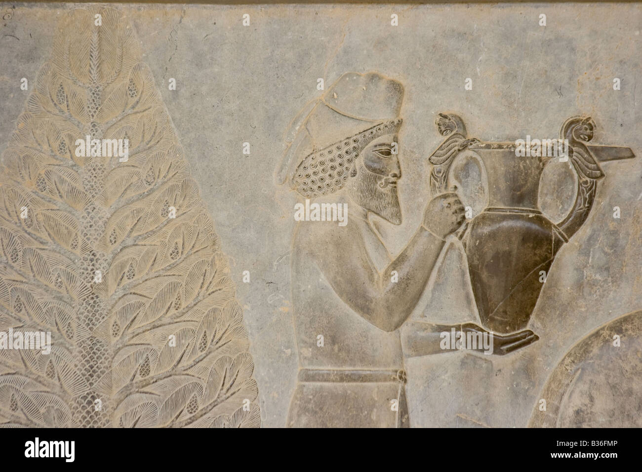 Stone Carved Relief of Vassal Countries Offering Tribute at the Ruins ...