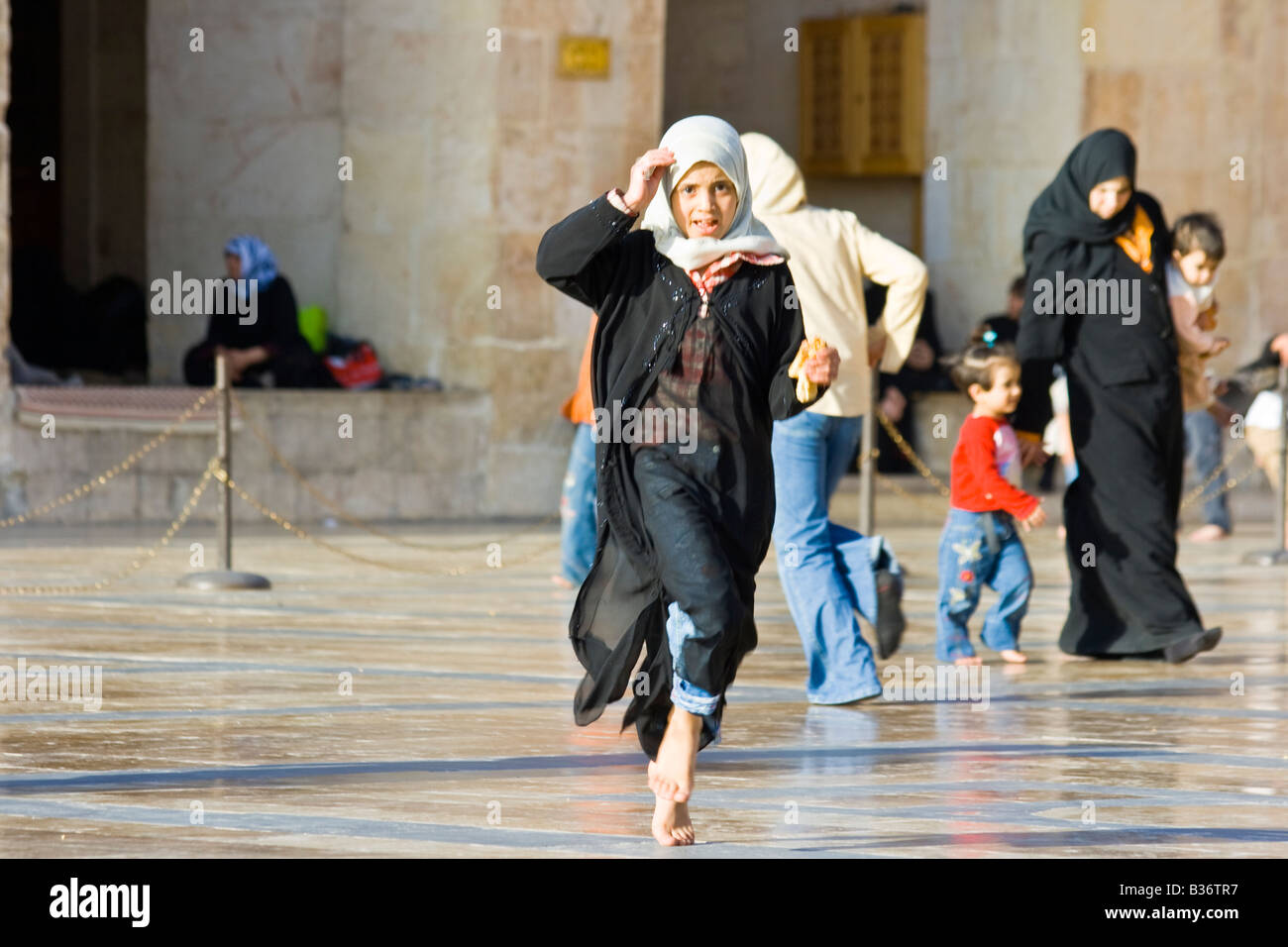 Young Muslim Girl in the Grand or Umayyad Mosque in the Old City in ...