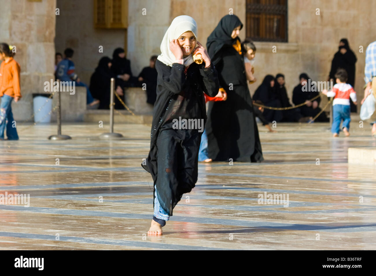 Young Muslim Girl in the Grand or Umayyad Mosque in the Old City in ...