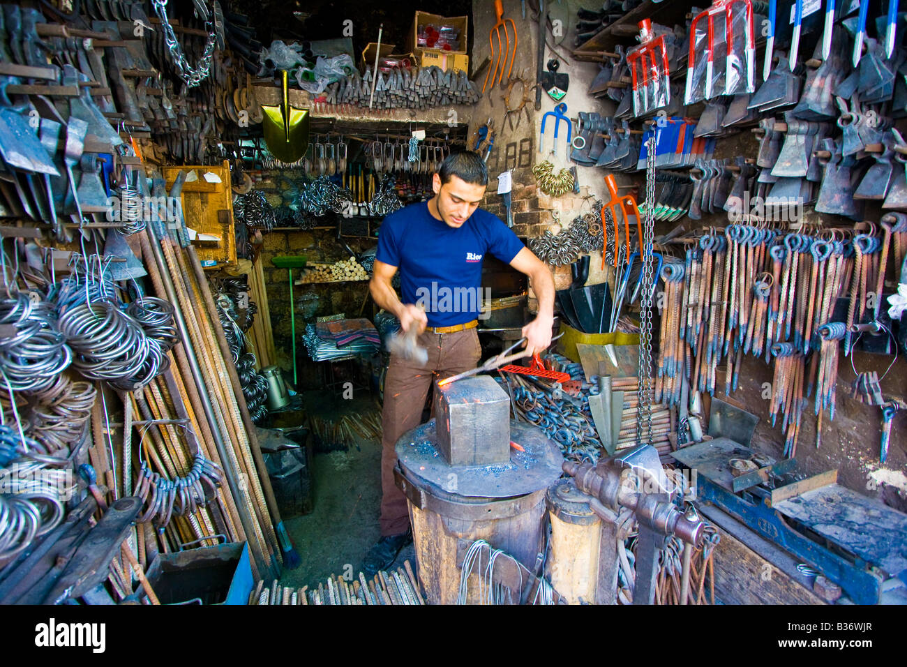 Hammering Bedu Tent Stakes at a Blacksmith Shop in the Old City in ...
