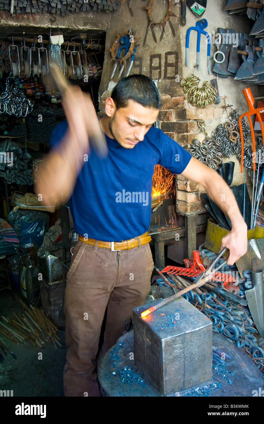 Hammering Bedu Tent Stakes at a Blacksmith Shop in the Old City in ...