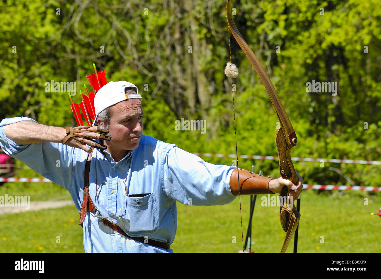 Traditional archer in action Stock Photo - Alamy