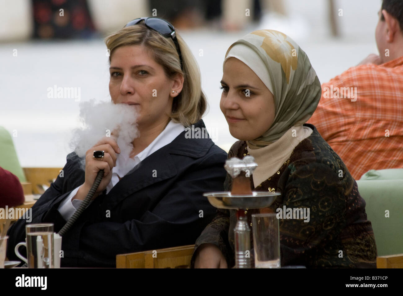 Woman smoking hookah hi-res stock photography and images - Alamy