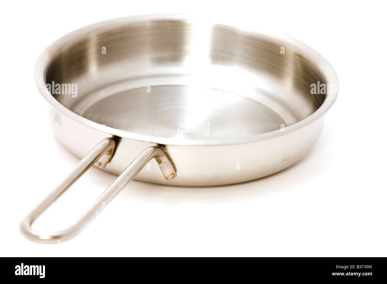 object on white kitchen utensil frying pan Stock Photo - Alamy