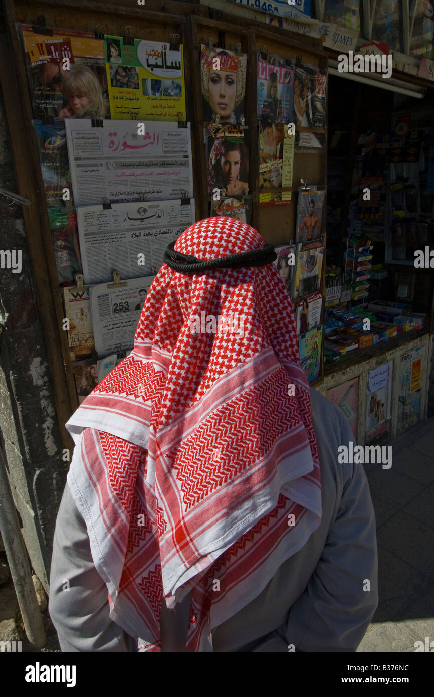 Arab Man in front of a News Stand in Damascas Syria Stock Photo - Alamy