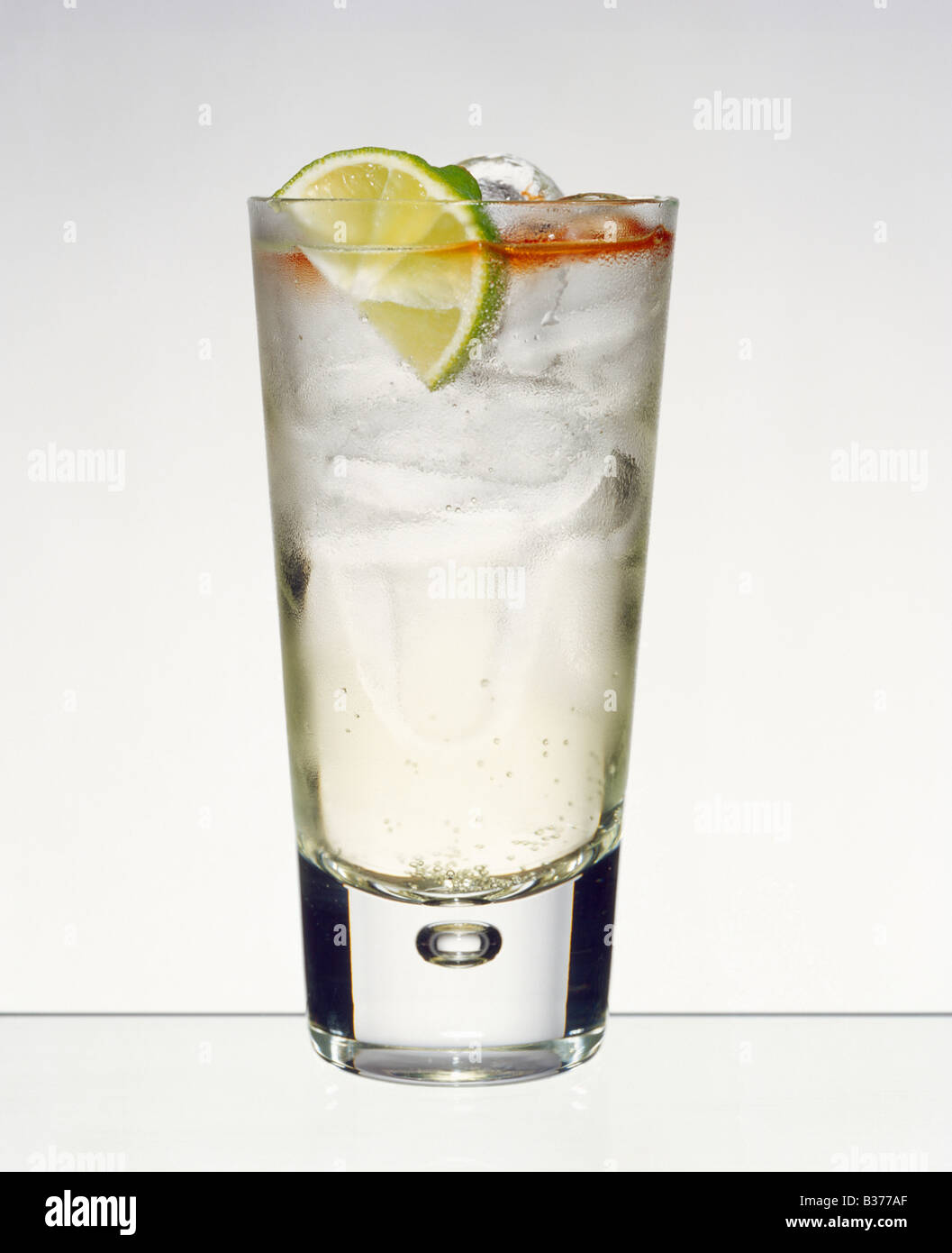 Cocktail Lime lemonade bitters Glass Highball Stock Photo - Alamy