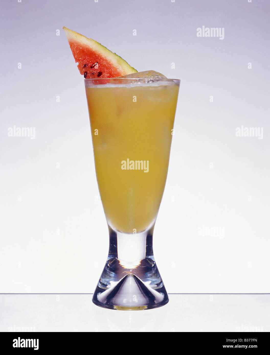 Cocktail June Bug Glass Sling Stock Photo - Alamy