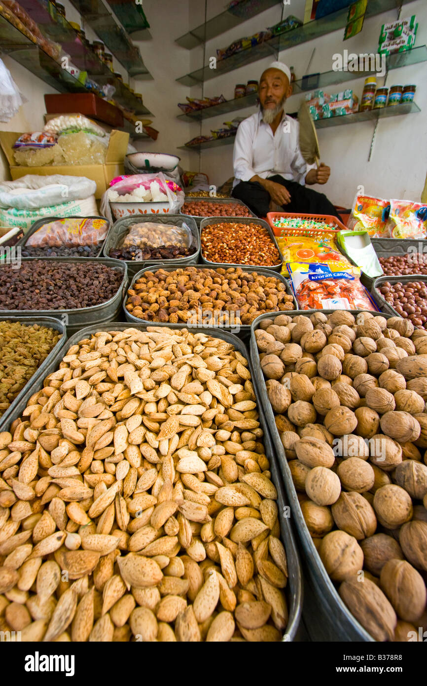 Uyghur Man Selling Nuts in Kashgar in Xinjiang Province China Stock ...