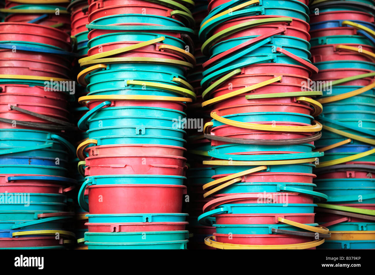 Colourful stack of buckets Stock Photo - Alamy