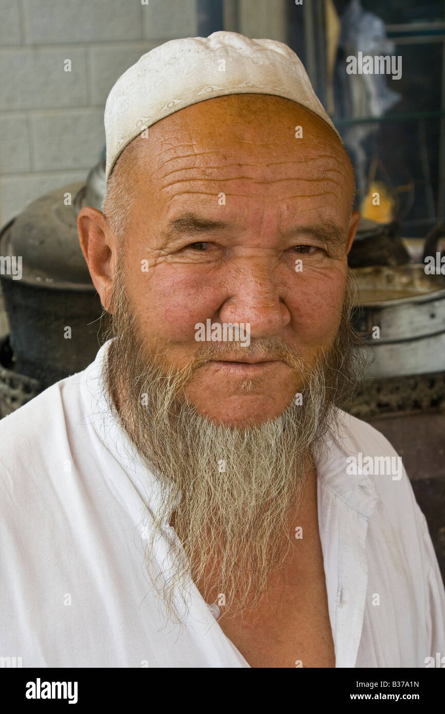 Uyghur Man in the Sunday Market in Hotan Xinjiang Province China Stock ...