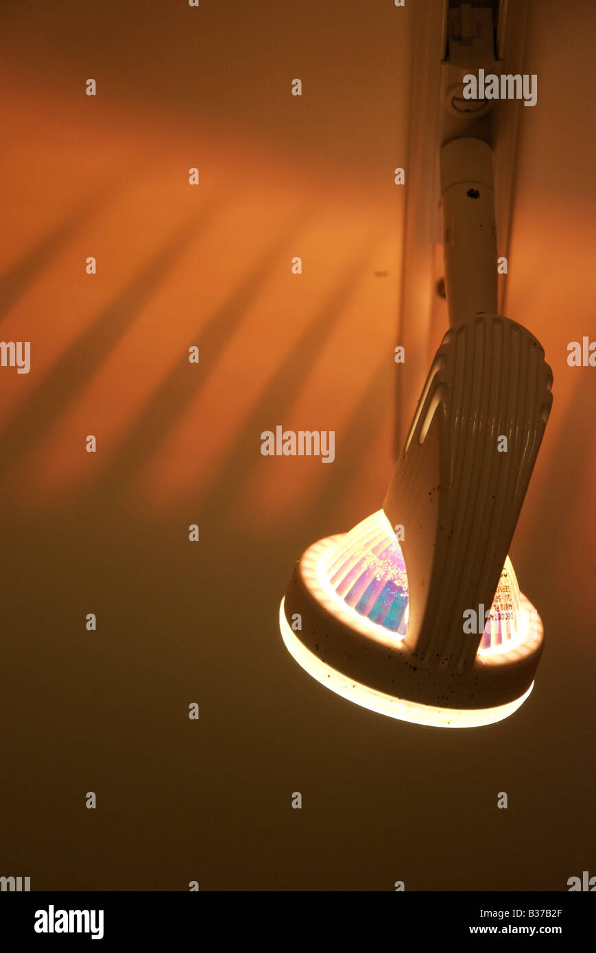Halogen light and colourful fan pattern on ceiling Stock Photo - Alamy