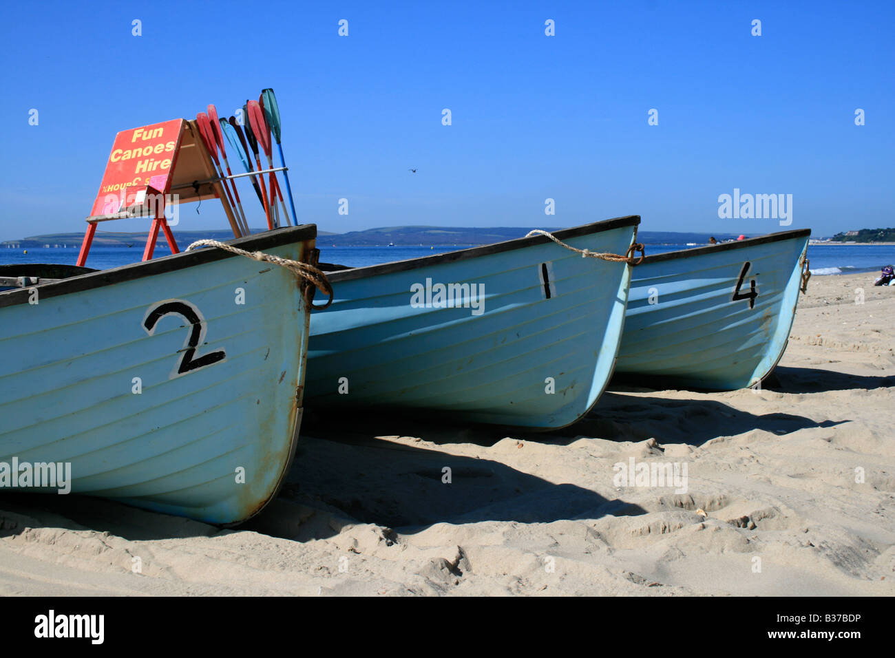 Three Blue Boats. Photograph by Kim Craig Stock Photo - Alamy