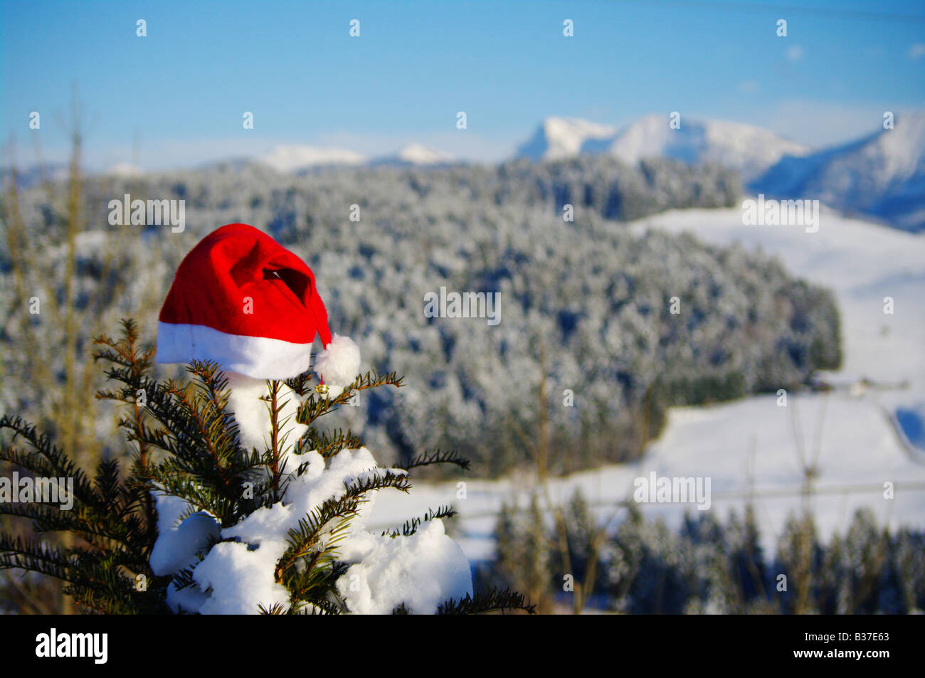 Santa Claus Christmas cap outside in a snowy landscape Stock Photo - Alamy