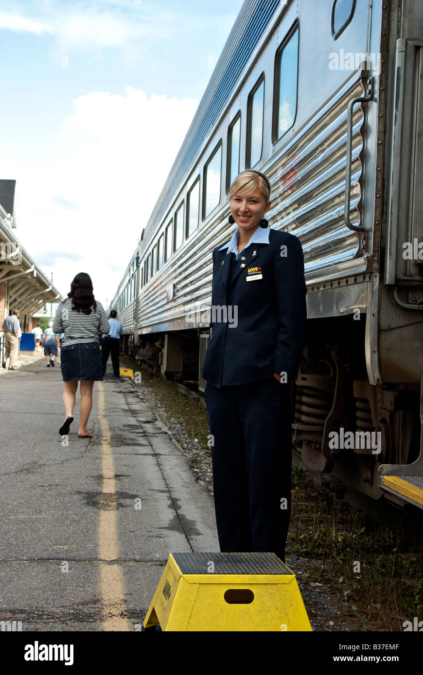 Pretty blond attendant train station hi-res stock photography and ...