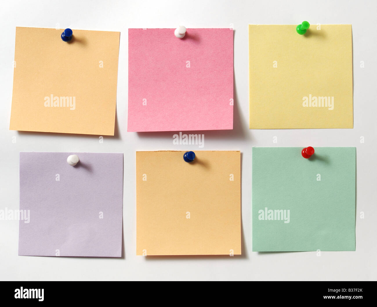 note Paper a note attached to a wall buttons it is isolated on a white ...