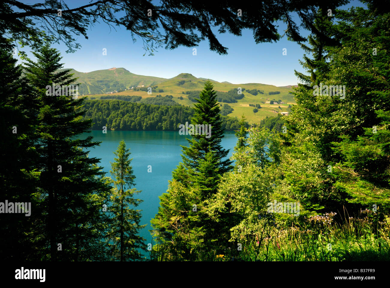 Lac Pavin, a lake formed in the crater of an extinct volcano, near ...