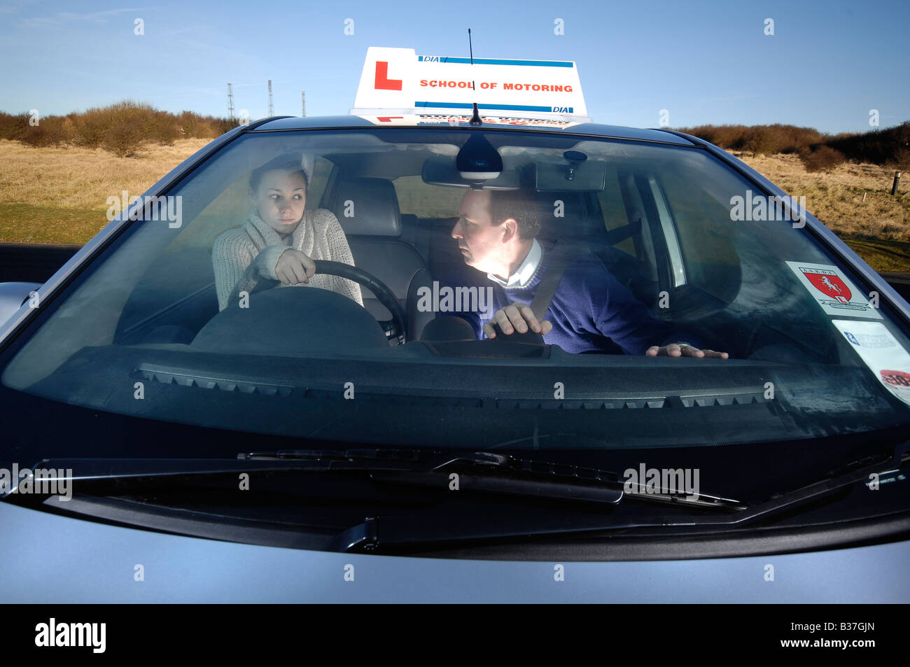 Scary driving instructor Stock Photo - Alamy