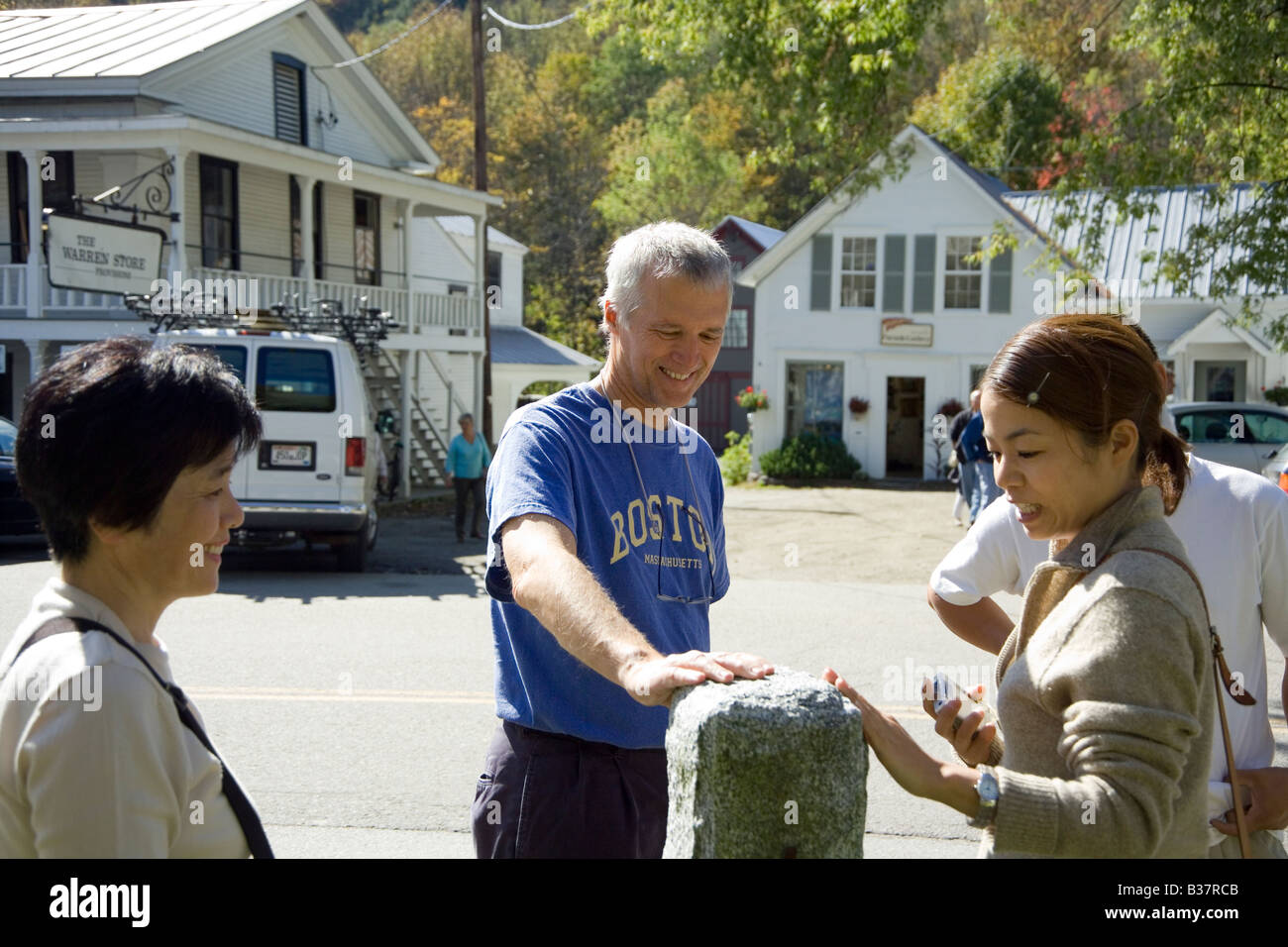 People touching stone Stock Photo - Alamy