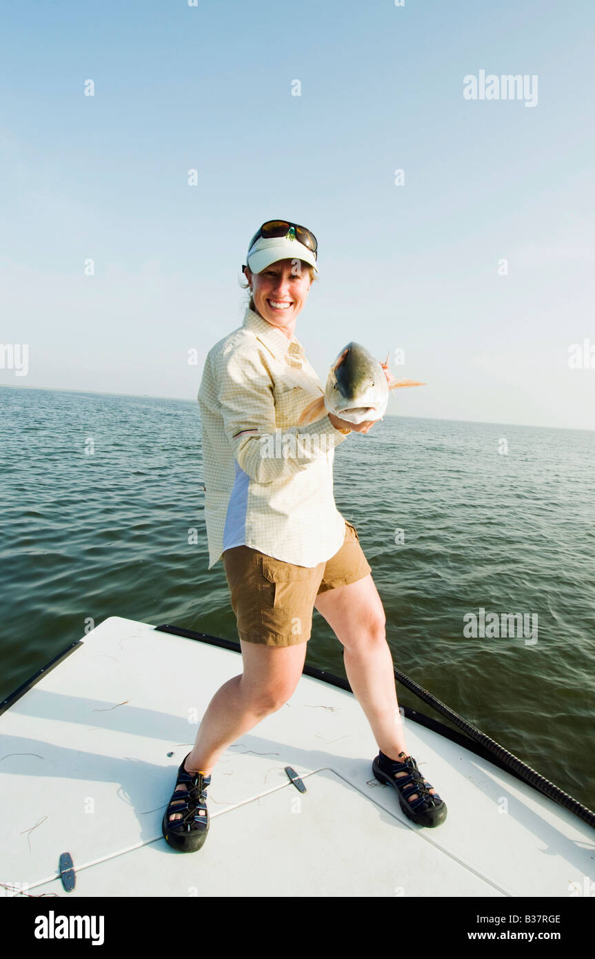 Fisherwoman shows her Redfish caught in the Laguna Madre off the Texas ...