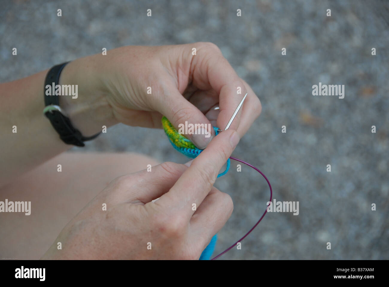 female hands doing needle work Stock Photo - Alamy