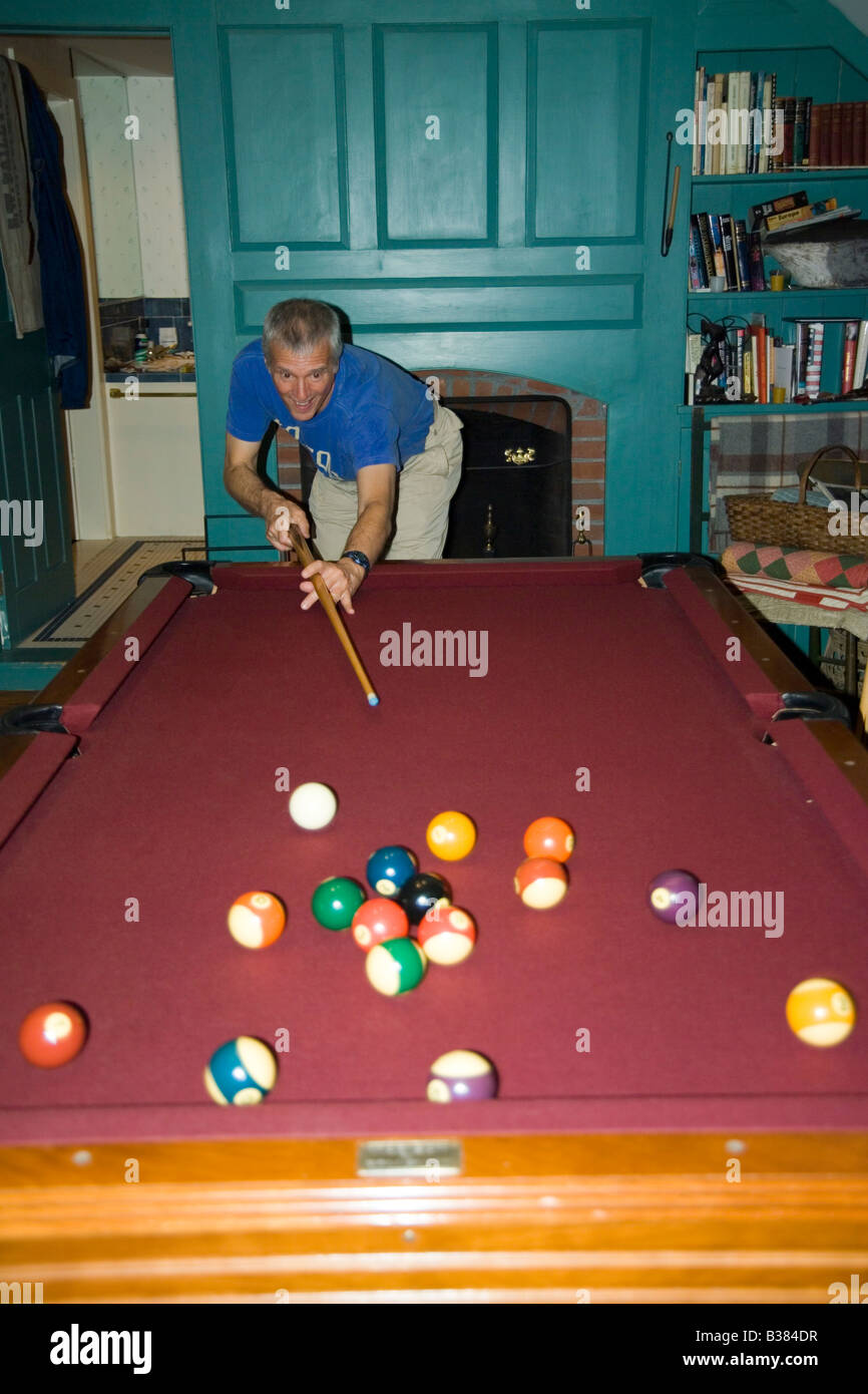 Man playing pool Stock Photo - Alamy