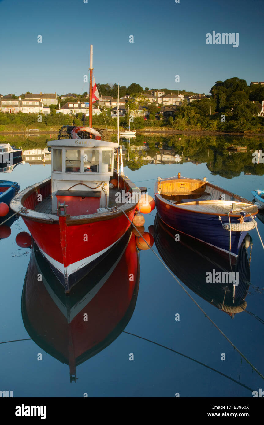 Small fishing boats on Hooe Lake at dawn Plymstock Plymouth Devon UK ...