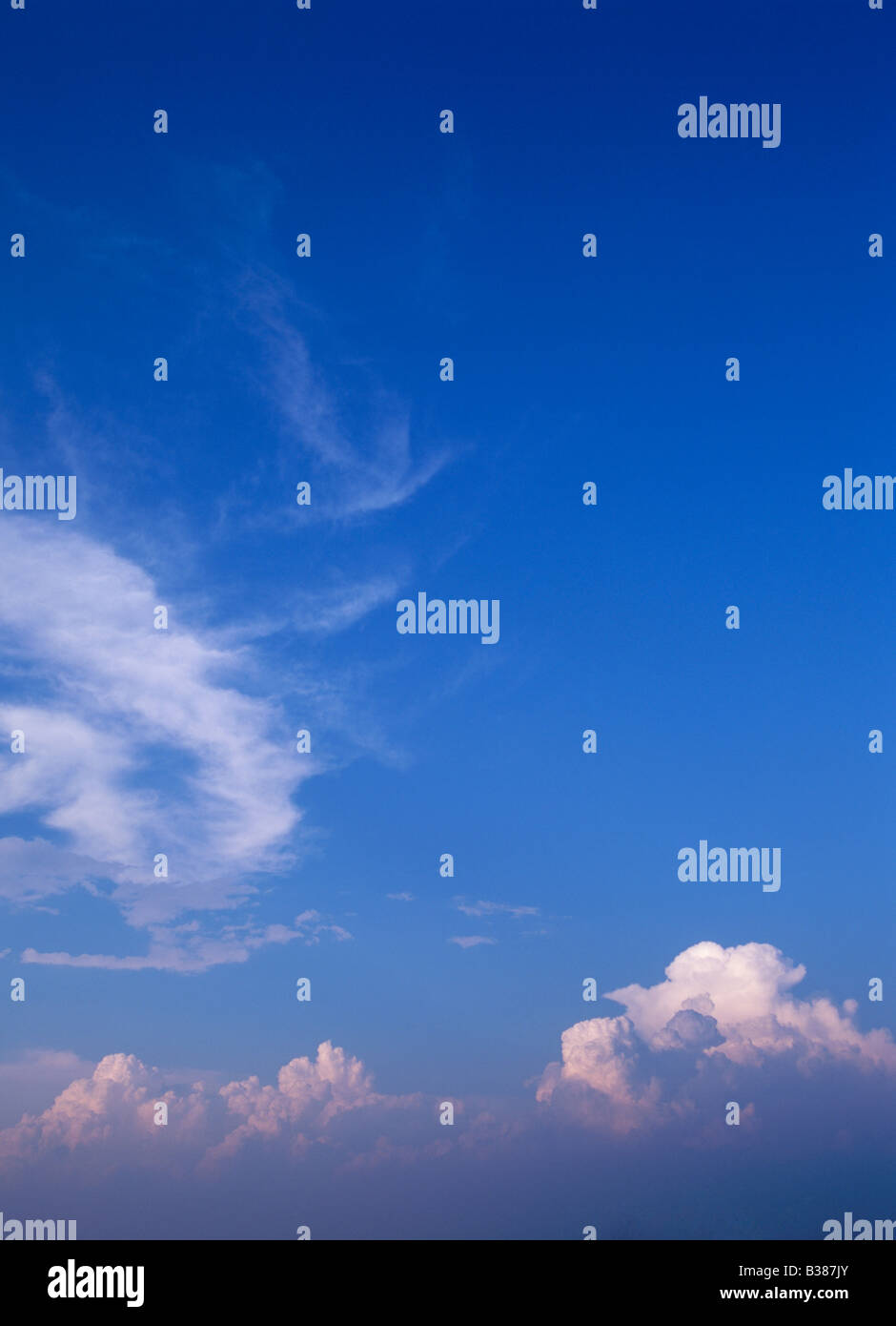 Cumulus and Cirrus clouds Stock Photo - Alamy
