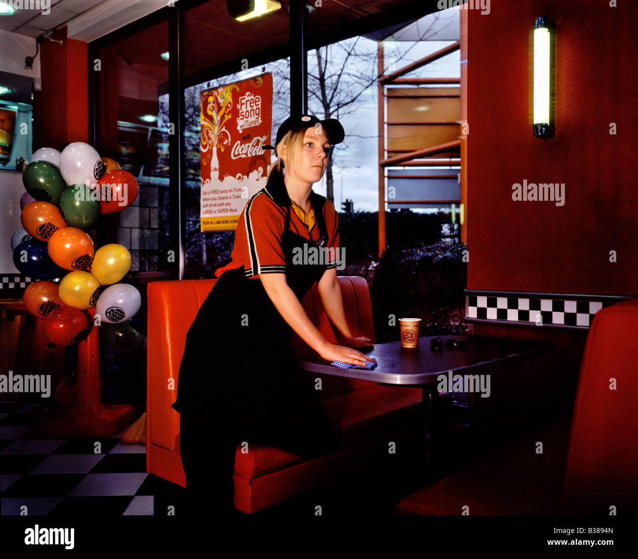 Fast food woman waiting tables Stock Photo - Alamy
