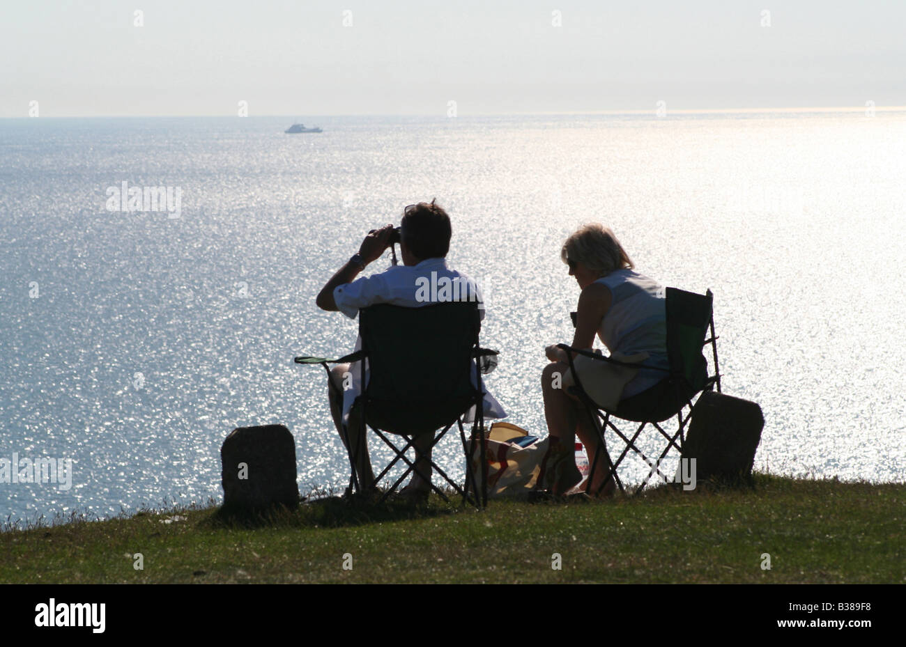 Couple watching boats hi-res stock photography and images - Alamy