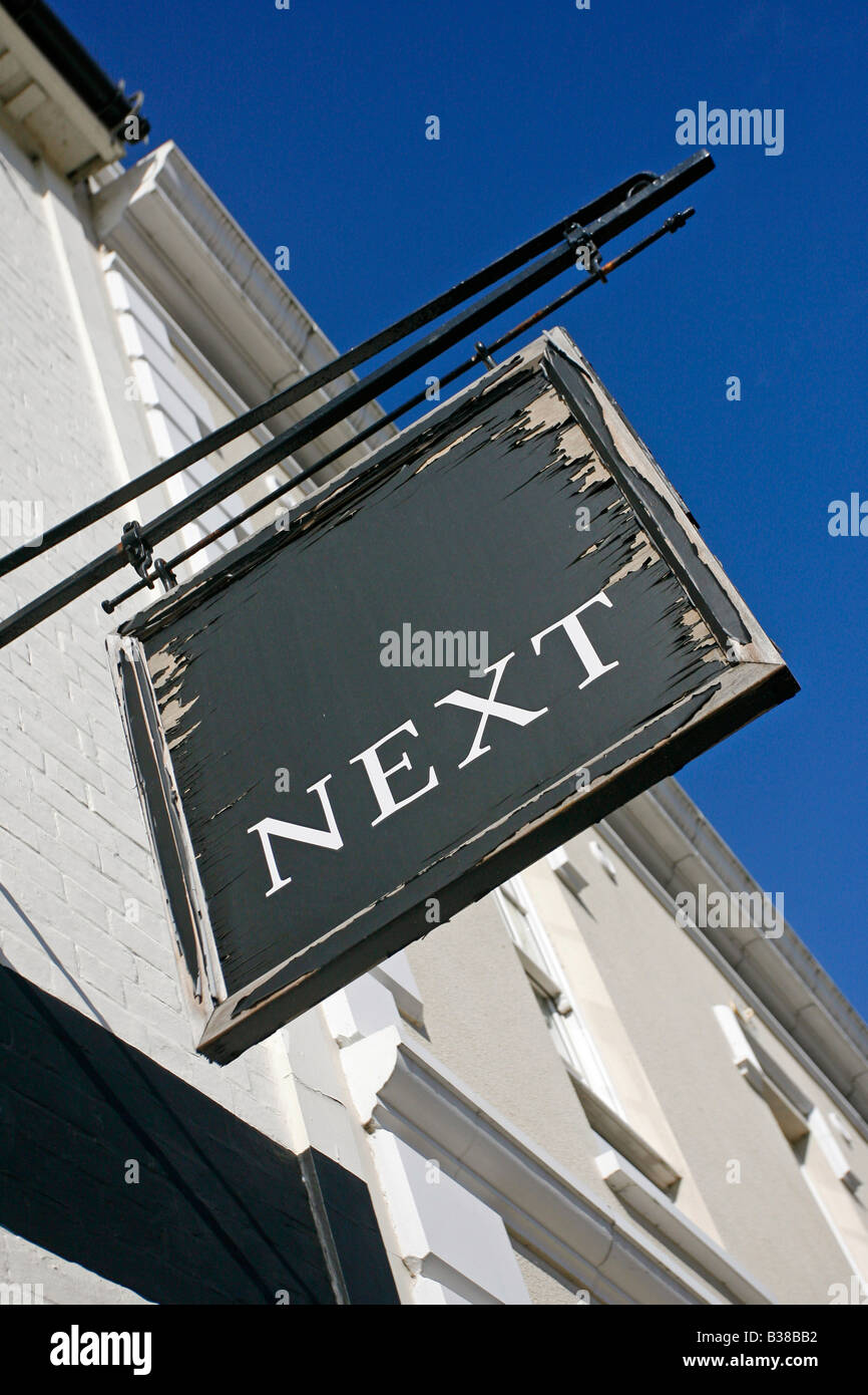 Next shop sign Stock Photo - Alamy