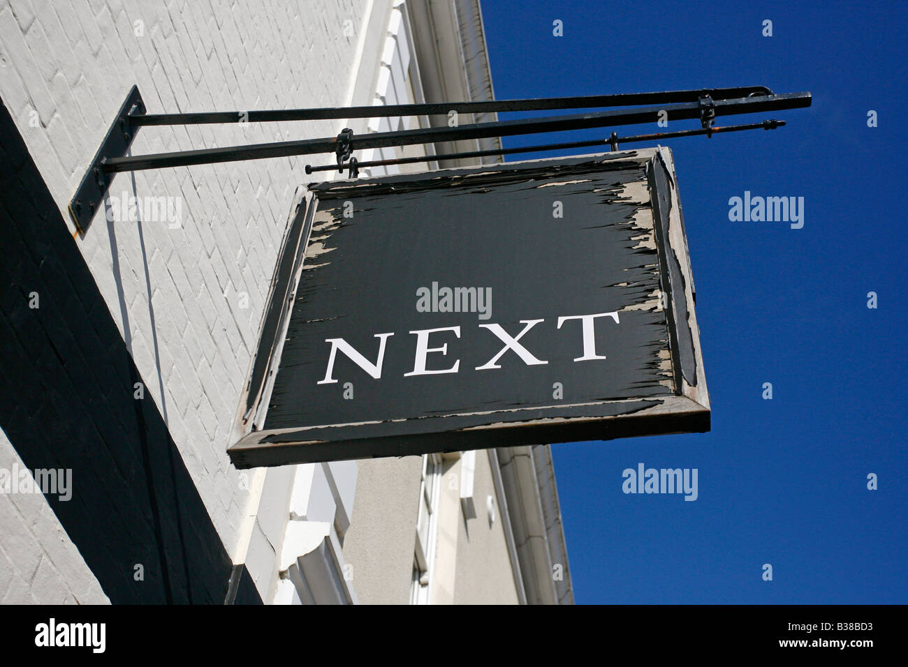 Next shop sign Stock Photo - Alamy