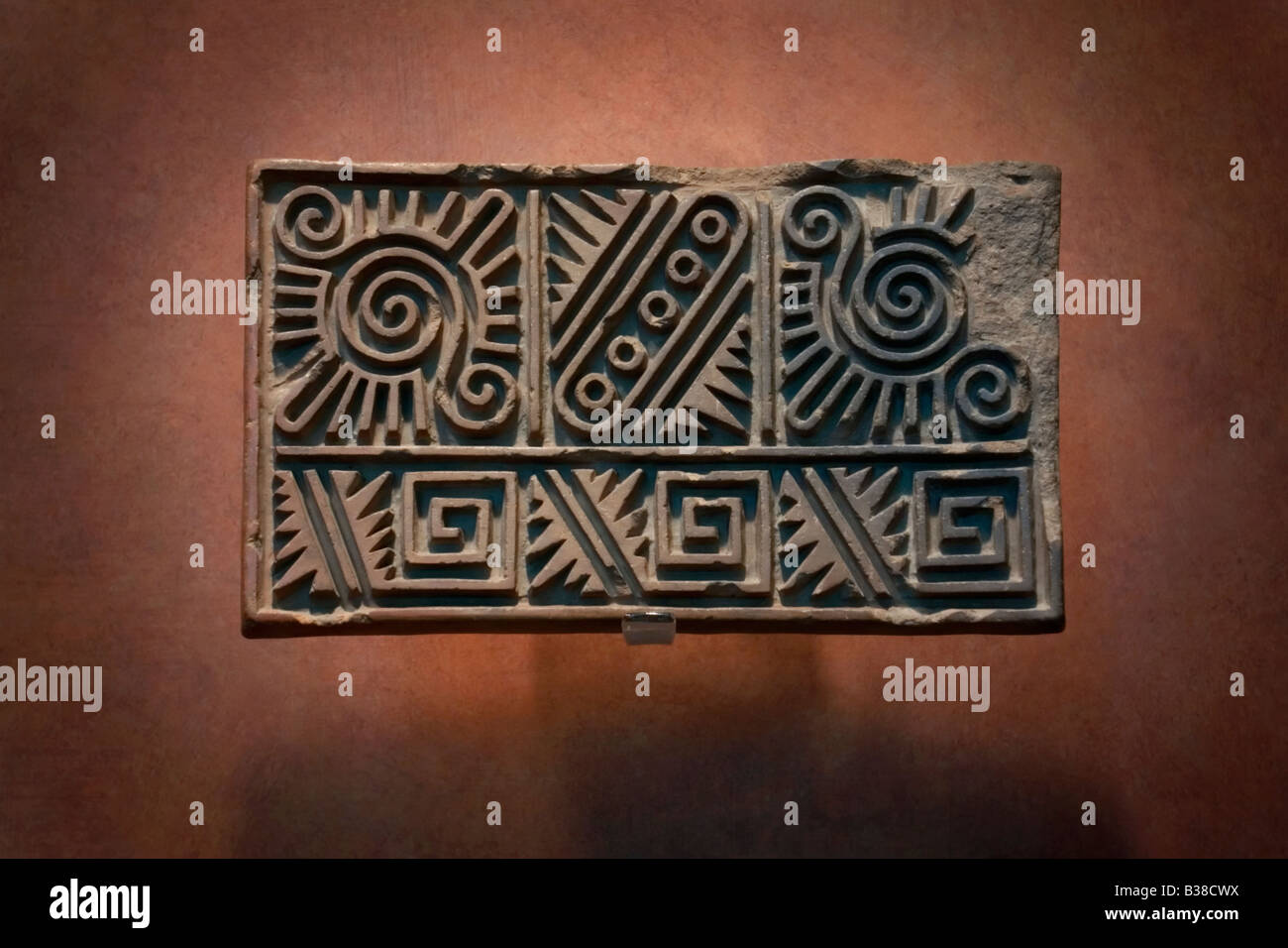 Aztec (Mexica) fired clay stamp with geometric designs used for body ...