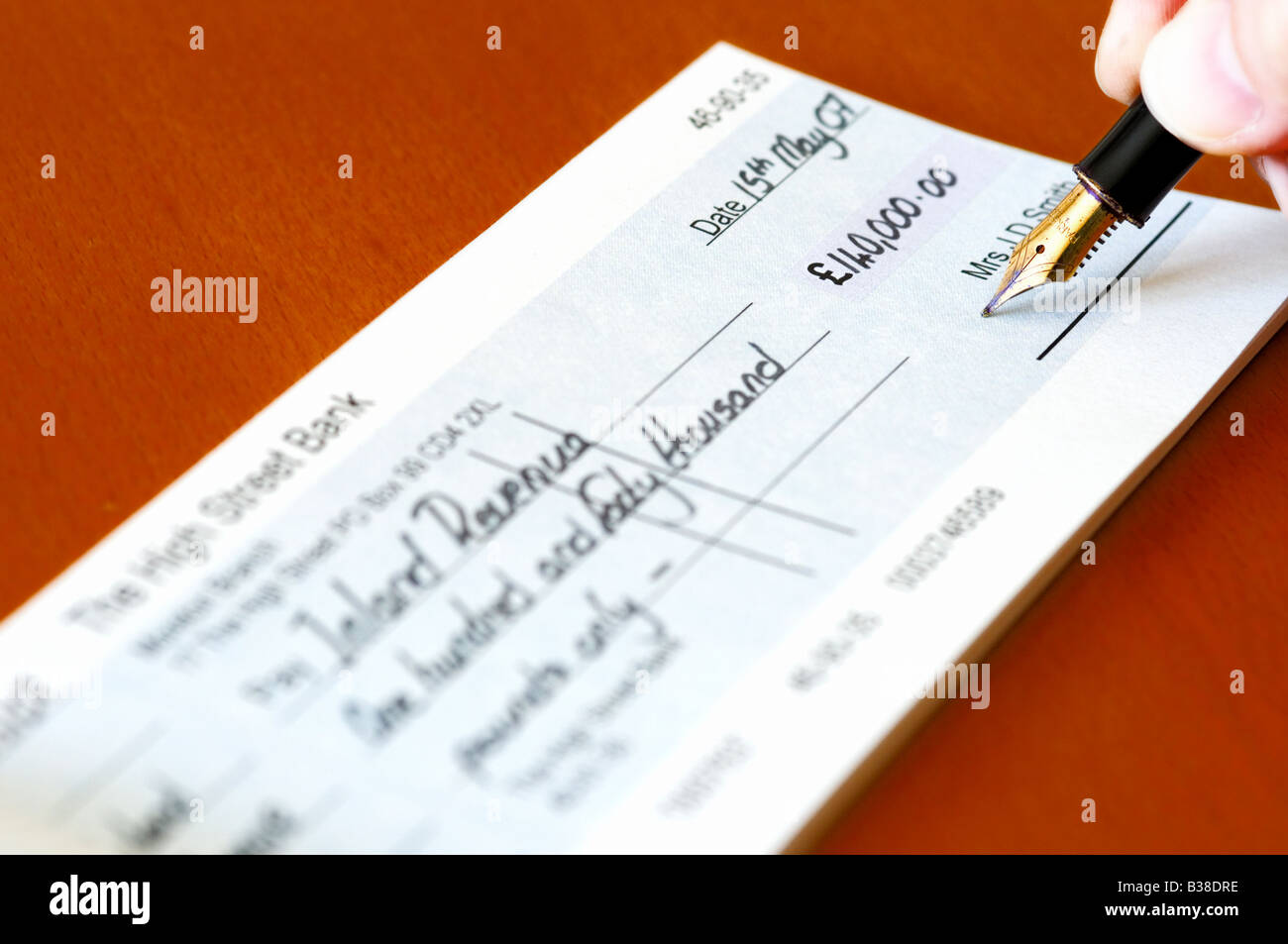 Person Writing A Check