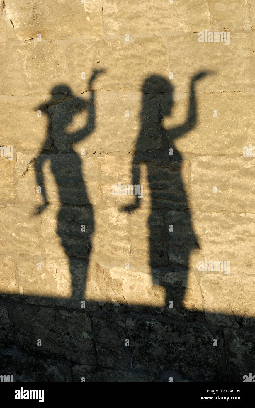 Shadows of two Dancing women Stock Photo - Alamy