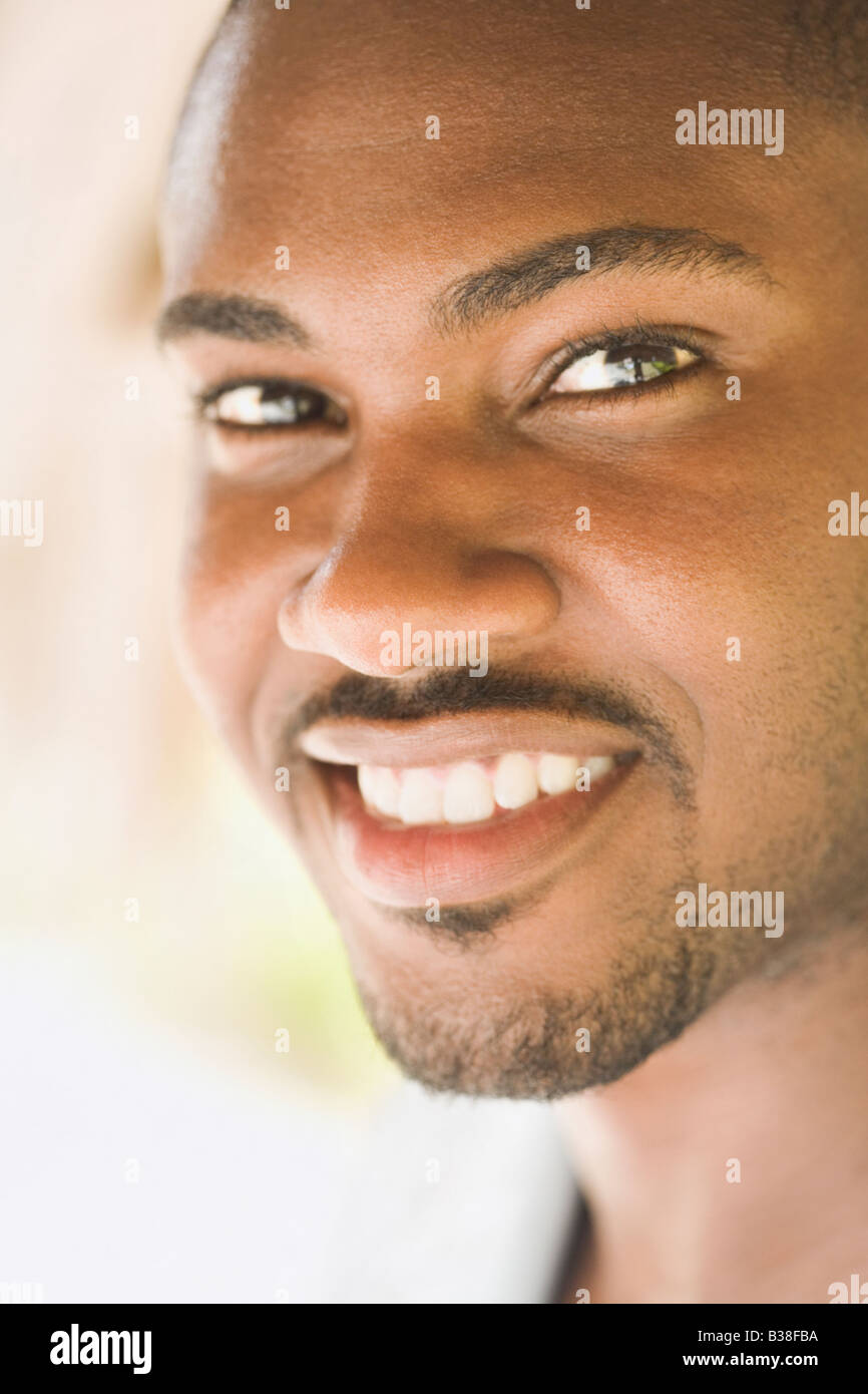 Close up of African man smiling Stock Photo - Alamy