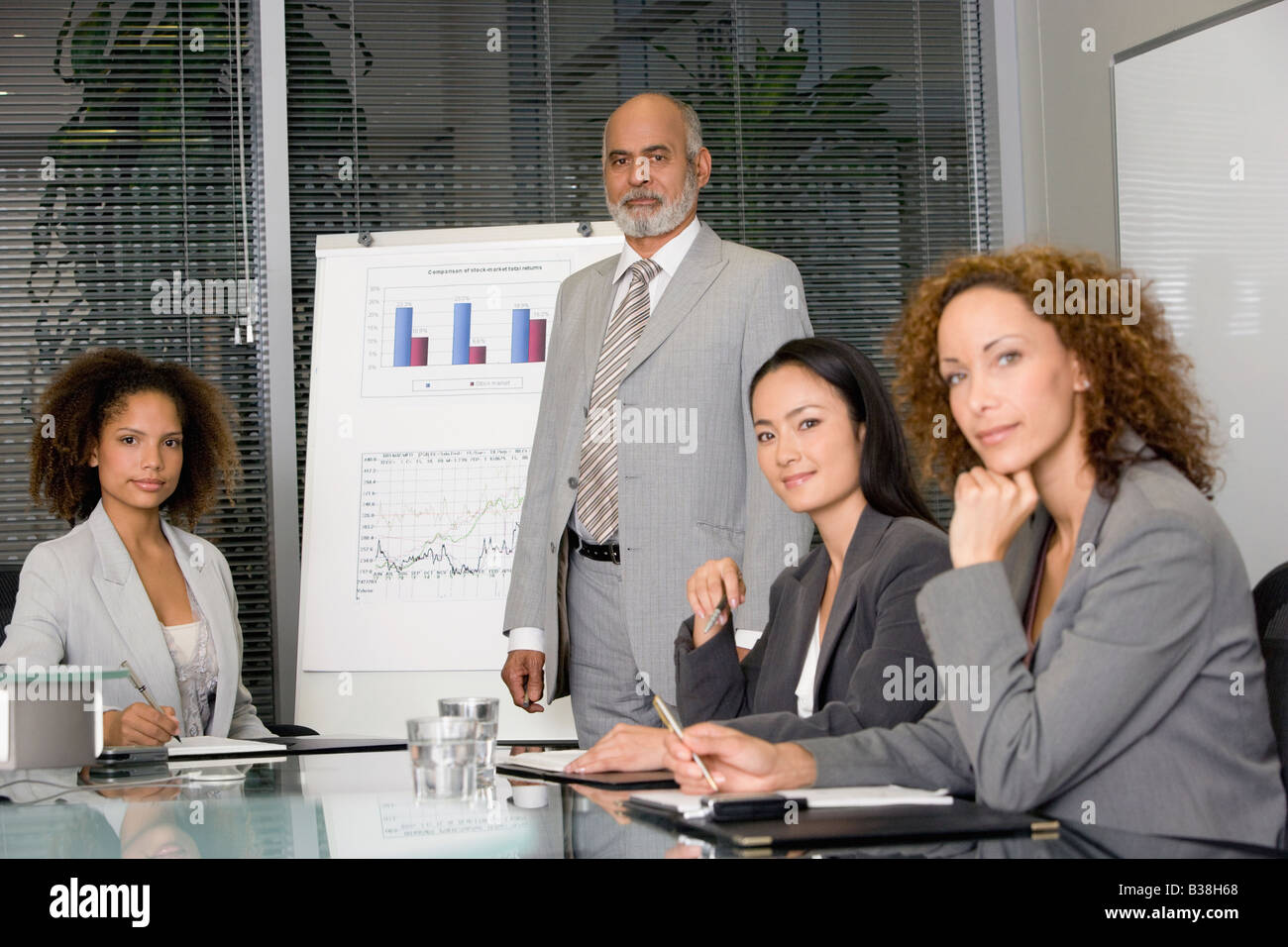 Senior African businessman giving presentation Stock Photo - Alamy