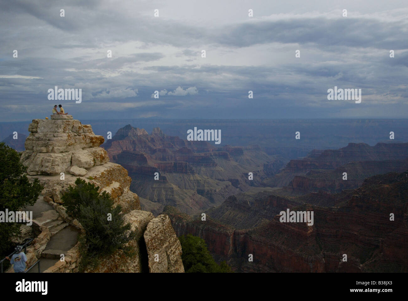 A couple views the north rim of the Grand Canyon from Bright Angel ...