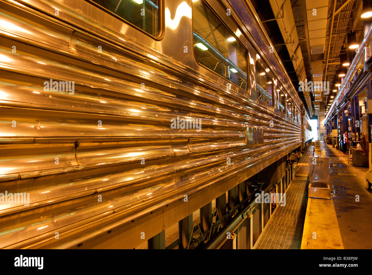 Passenger rail train cars in maintenance shop awaiting inspection and ...