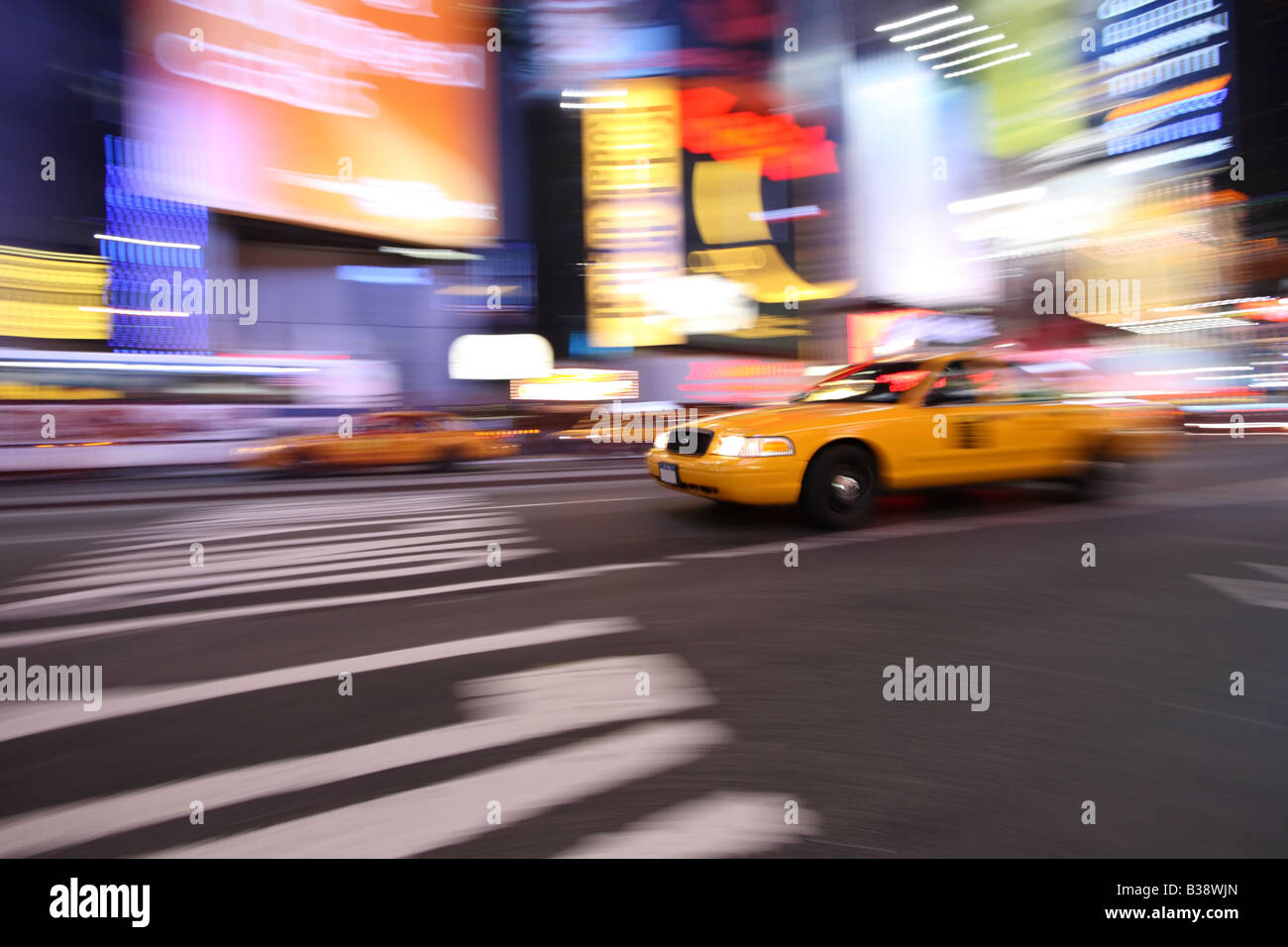 New York City taxi in the excitement of Times Square; Ultra-Wide Angle ...