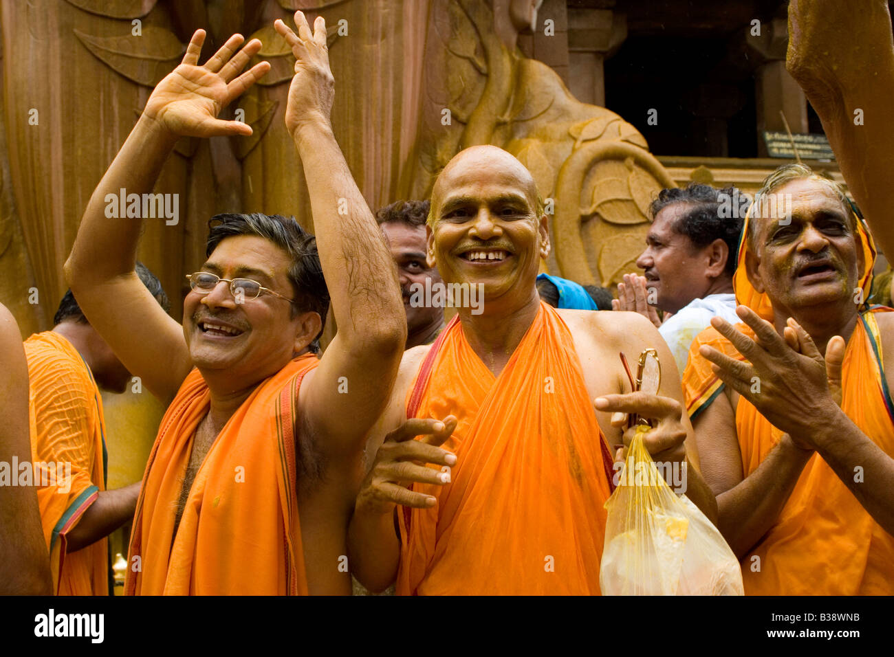 Jain pilgrims drenched in rain and colour dance at the feet of the ...