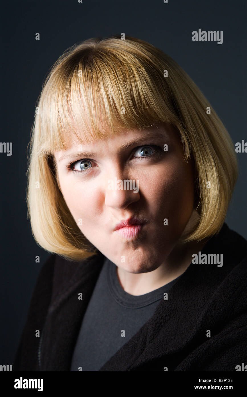 Young caucasian woman with bad look on her face Stock Photo - Alamy