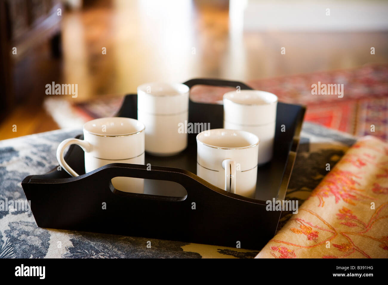 Tray holding four coffee cups Stock Photo - Alamy