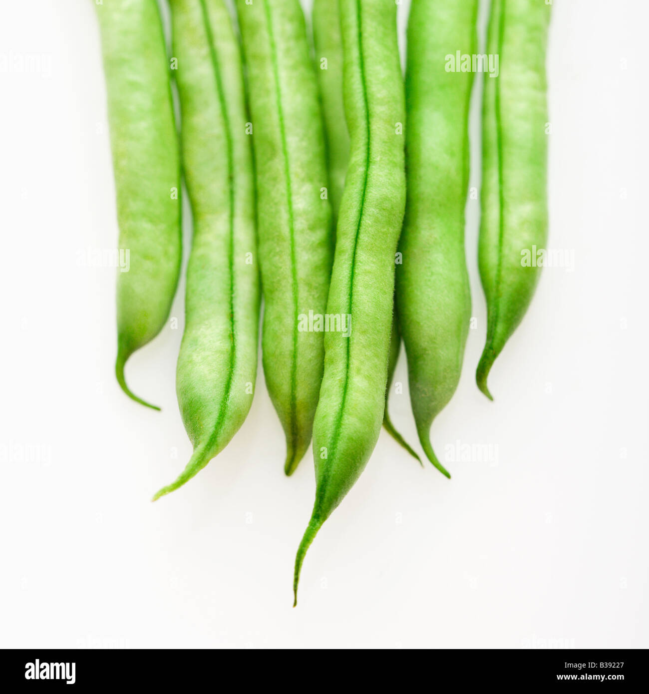 Close up of green beans on white background Stock Photo - Alamy